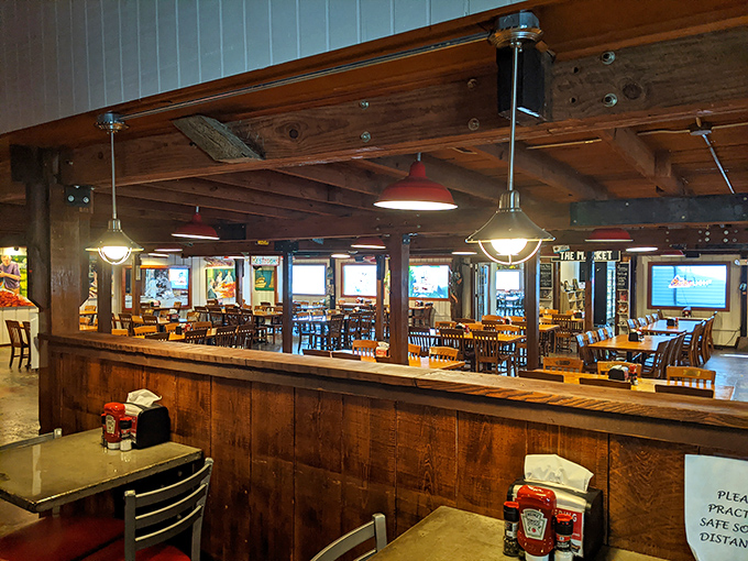 Rustic wooden beams and simple furnishings set the stage where the real stars—gumbo, étouffée, and crawfish—perform their delicious magic.
