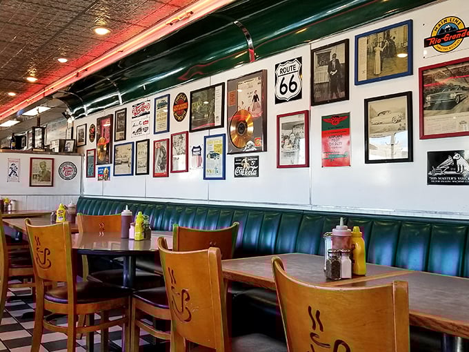 Inside, turquoise vinyl booths sit beneath walls adorned with Route 66 memorabilia and vintage photos – a museum where the exhibits come with side orders.