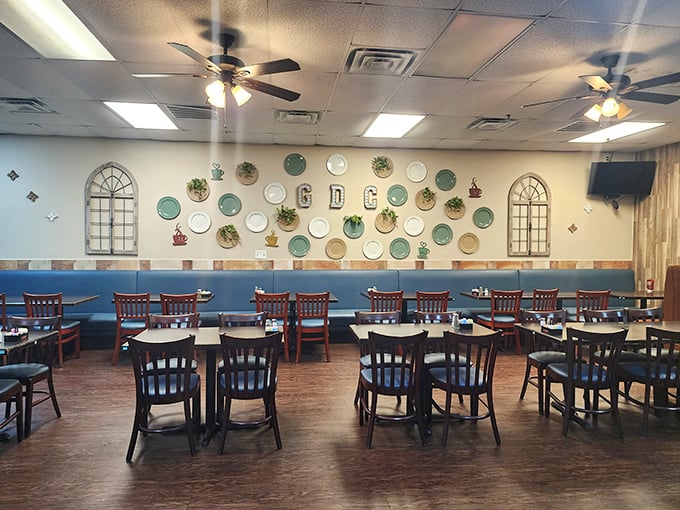 The decorative plates aren't just wall art—they're a silent promise that empty plates are the highest compliment here.