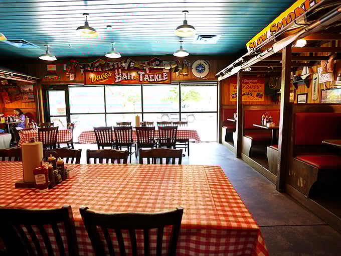 Red checkered tablecloths and fishing memorabilia create the perfect backdrop for the meat-centric feast that awaits.