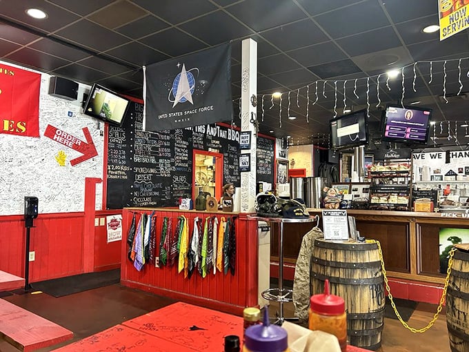 Military memorabilia and a Space Force flag share space with the legendary menu board. This isn't just a restaurant—it's a community gathering place.