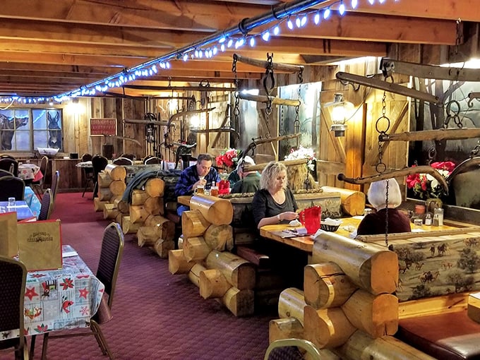 Log cabin dining at its finest! These hand-hewn booths aren't just Instagram gold—they're the perfect setting for the serious business of steak appreciation.