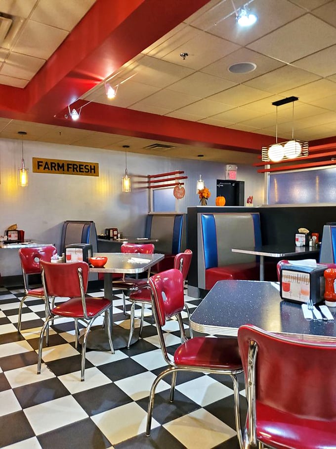 Classic diner aesthetics meet modern comfort inside. Those cherry-red vinyl booths aren't just Instagram-worthy—they're the perfect perch for pancake appreciation.