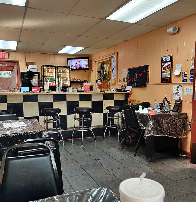 That classic black-and-white checkered counter isn't trying to be retro-cool – it's the real deal, unchanged because perfection needs no updates.