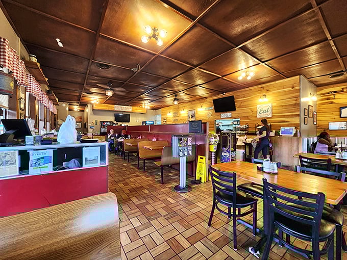 Wood paneling, warm lighting, and that classic diner layout – stepping inside feels like breakfast at your favorite aunt's house, if she could cook for 50.