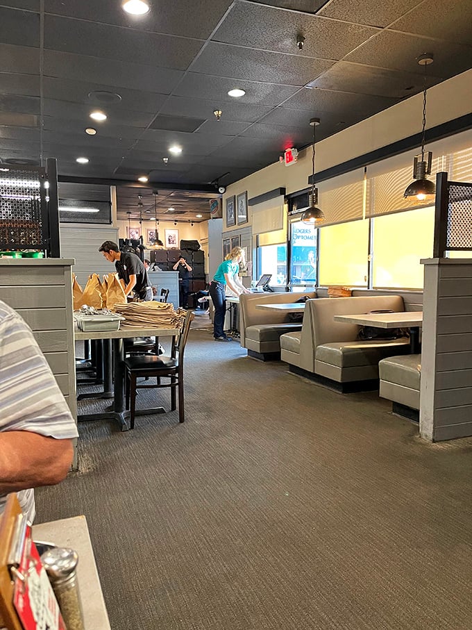 Inside, comfortable booths and no-nonsense décor let you know you're here for one thing only: serious barbecue business.