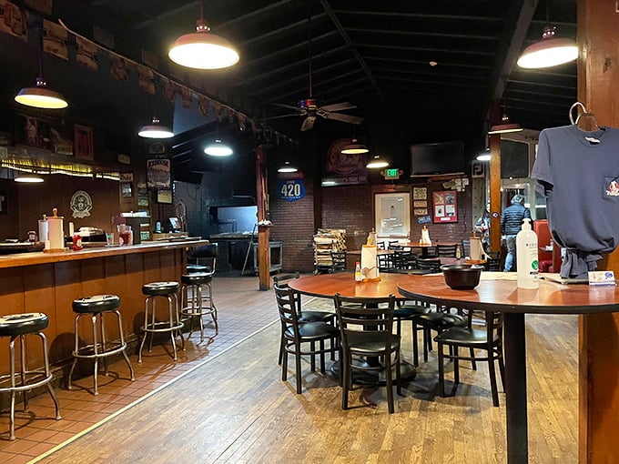 Inside, wooden floors and pendant lighting create that perfect "serious about barbecue but not too fancy to lick your fingers" atmosphere.