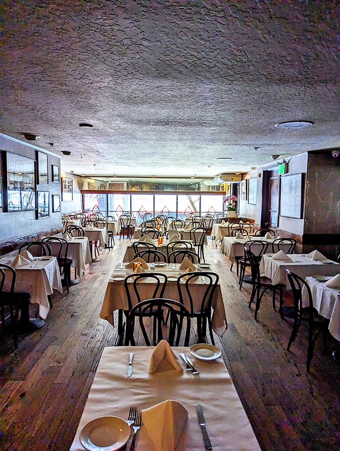 Step inside and time stands still – white tablecloths, bentwood chairs, and that unmistakable old-school charm that no modern restaurant can replicate.