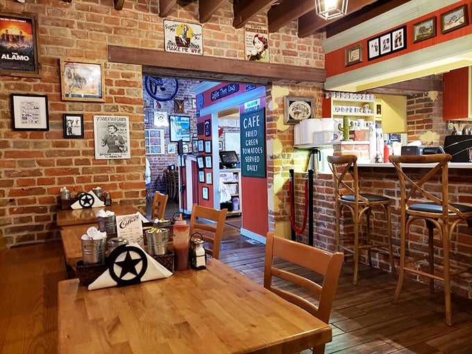 Exposed brick walls tell stories while Texas memorabilia creates a museum-like quality that never feels stuffy—just like home, if home served incredible food.