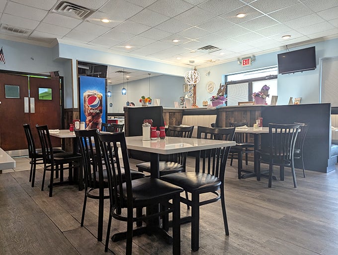 Where conversations flow as freely as the coffee. Clean lines, comfortable seating, and the promise of a meal that satisfies both nostalgia and hunger.