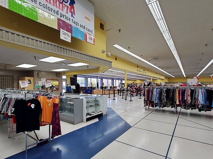 Step inside and the vastness reveals itself—a color-coded wonderland where yesterday's fashion finds tomorrow's fashionista at a fraction of retail prices.