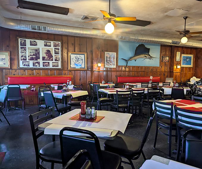 Step inside and time stands still—wood paneling, mounted fish, and red vinyl booths create the perfect backdrop for Maryland's favorite pastime: serious crab consumption.