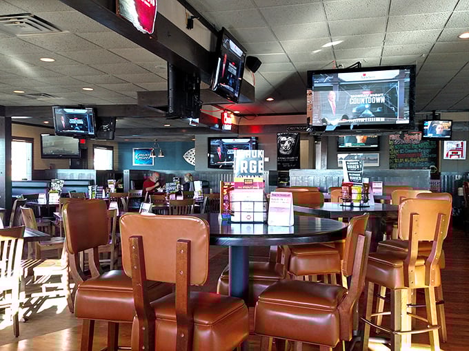 Leather chairs, multiple TVs, and that unmistakable sports bar energy—this is Wisconsin's living room where strangers become friends over burgers.