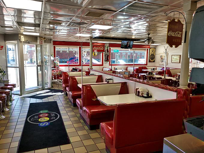 Classic red vinyl booths and gleaming countertops – this isn't retro by design, it's authentic by survival. Time travel never tasted so good.