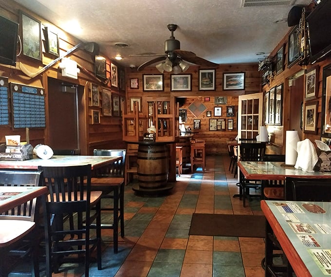 Warm wood paneling, memorabilia-covered walls, and that unmistakable aroma of grilled beef – this is burger church, and you're about to become a convert.