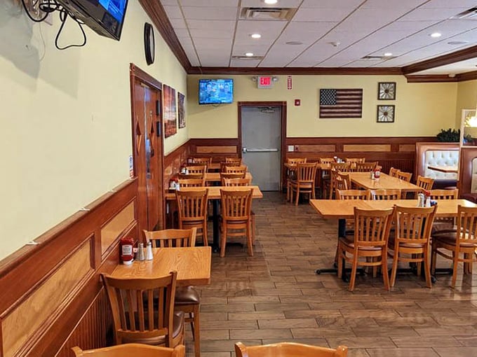 Classic wooden chairs await their next storytellers. In diner-speak, this isn't just seating—it's the stage for life's conversations.