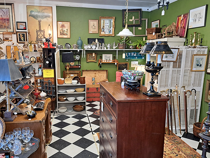 Each vendor booth creates its own little world—this one with its checkerboard floor and green walls feels like stepping into your stylish grandmother's dream kitchen.