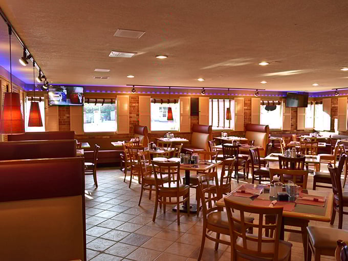 Inside, the warm wood tones and comfortable booths create that perfect diner atmosphere – where conversations flow as freely as the coffee.