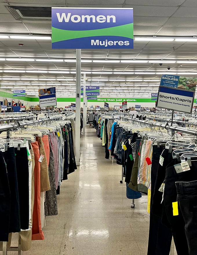 The women's section stretches like a textile ocean, organized by color and size. Fashion democracy in action!