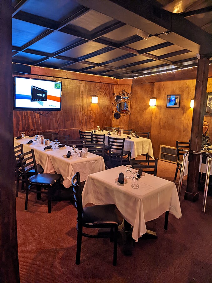 Wood-paneled walls, white tablecloths, and just the right lighting—this dining room wasn't designed for Instagram, but for serious steak appreciation.