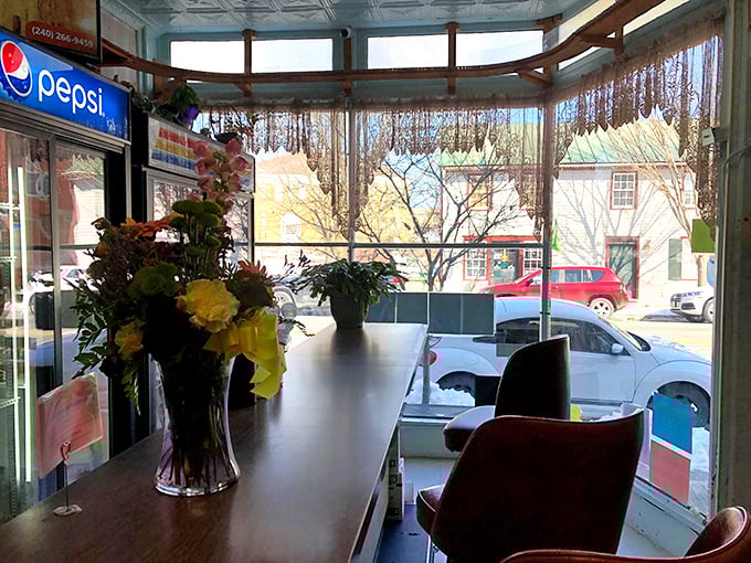 Sunlight streams through those windows onto a tin ceiling that's seen decades of happy breakfast conversations.