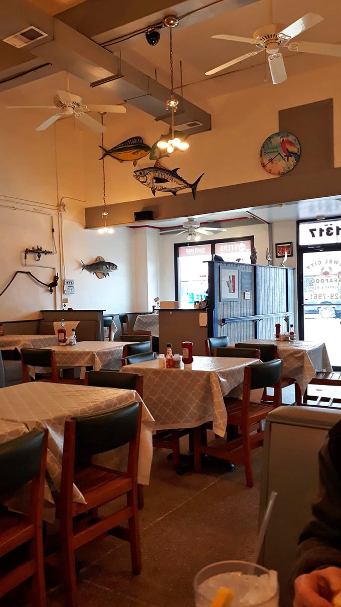 Wooden tables, fish replicas, and ceiling fans create the perfect no-nonsense atmosphere. This isn't about the décor—it's about directing all attention to what lands on your plate.