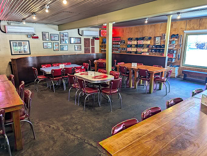 Simple red chairs and wooden tables create a no-frills sanctuary where the only decoration needed is the anticipation of what's coming to your tray.