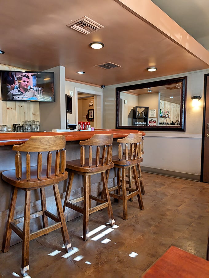 Those wooden bar stools have witnessed countless celebrations, first dates, and "I can't believe how good this is" moments. Classic steakhouse comfort at its finest.