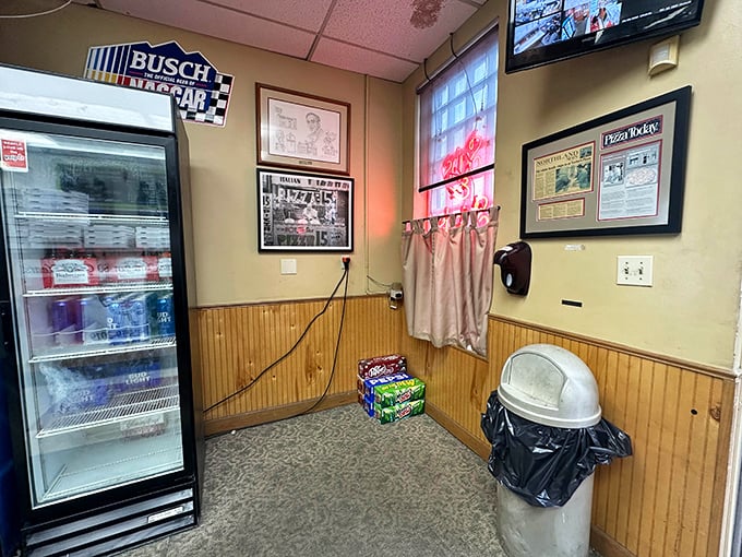 Inside, wood paneling and memorabilia tell the story of decades serving Columbus. This isn't Instagram-bait decor—it's authentic pizza joint history.