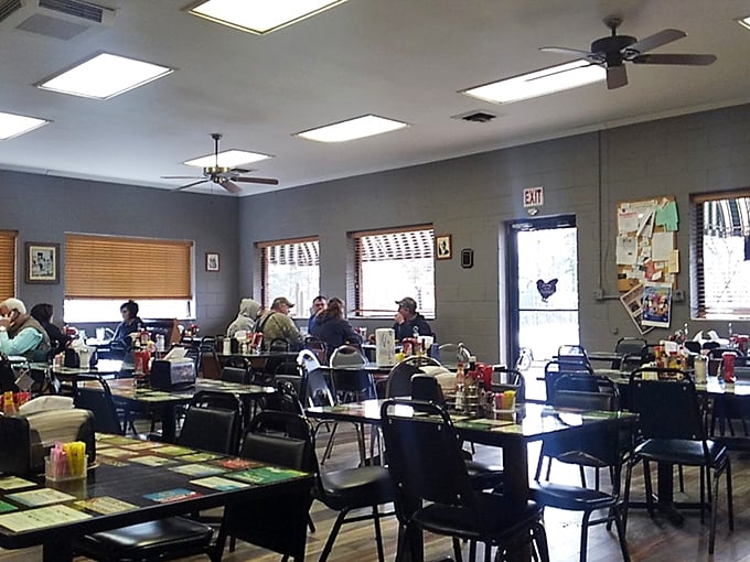 Simple tables, ceiling fans, and locals chatting—this is where real Arkansas dining happens, no frills required.