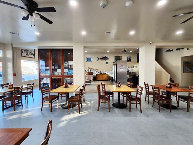 Simple wooden tables and no-nonsense chairs set the stage for seafood stardom. Here, the ocean's bounty takes center stage, not the decor.