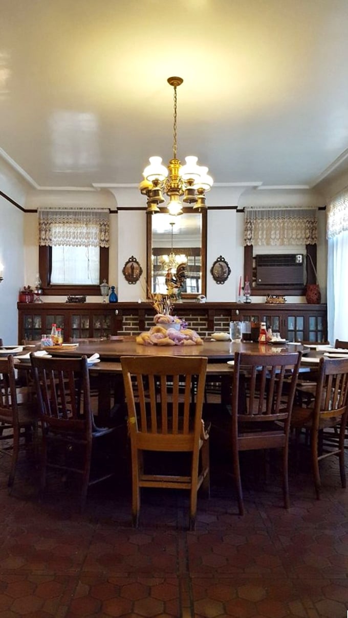 Round tables with lazy Susans at their center aren't just charming—they're genius. No more awkward "please pass the chicken" moments here.