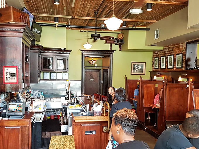 Wooden booths, exposed brick, and a ceiling that whispers stories of meals past—this isn't just a restaurant, it's Richmond's living room.