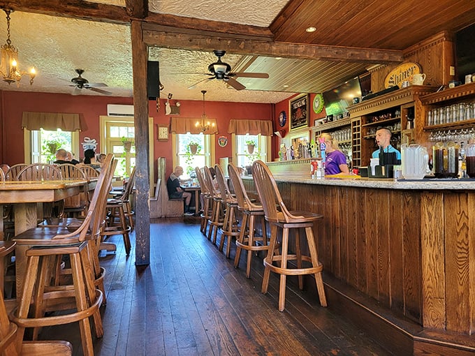 The tavern's bar area combines rustic charm with modern comfort—exactly where you'd want to nurse a craft beer after a long day of Pennsylvania adventuring.