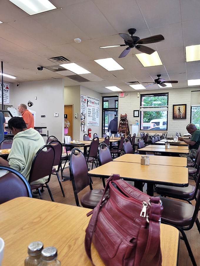 No designer lighting or trendy decor here—just honest tables, ceiling fans, and the promise of a meal that speaks volumes without saying a word.