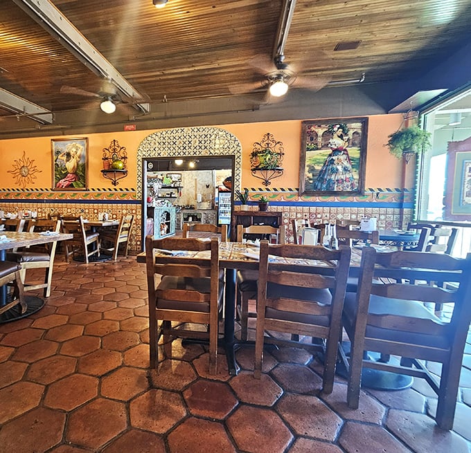 Wooden ceiling beams, terracotta tiles, and warm colors create that "abuela's dining room" feeling that no corporate designer could ever replicate.