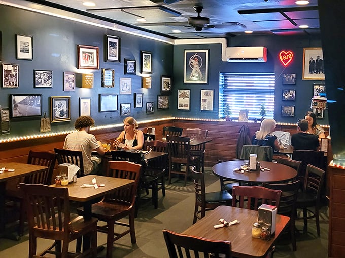 Inside, the blue walls adorned with decades of memories create that perfect tavern atmosphere – not too fancy, not too dive-y, just right.
