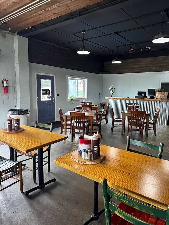 Simple wooden tables, practical chairs, and sauce bottles at the ready. This dining room says, "We put our energy into the meat, not the décor."