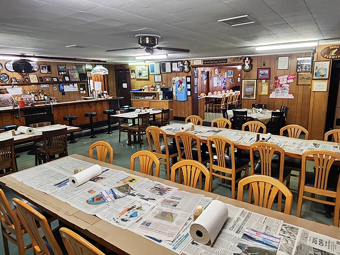 Wood-paneled walls covered in memories – like your favorite uncle's basement, but with better food.