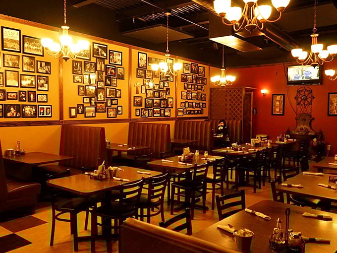 This wall of memories proves that good food creates lasting connections – every photo tells a pasta-filled story.