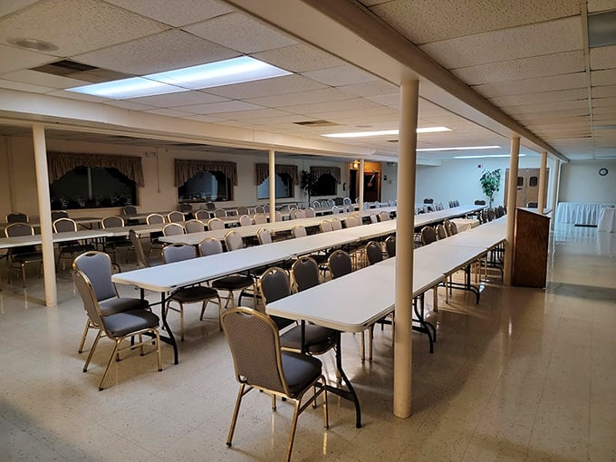 Those long tables aren't just furniture—they're peacekeeping treaties between strangers united by fried chicken.
