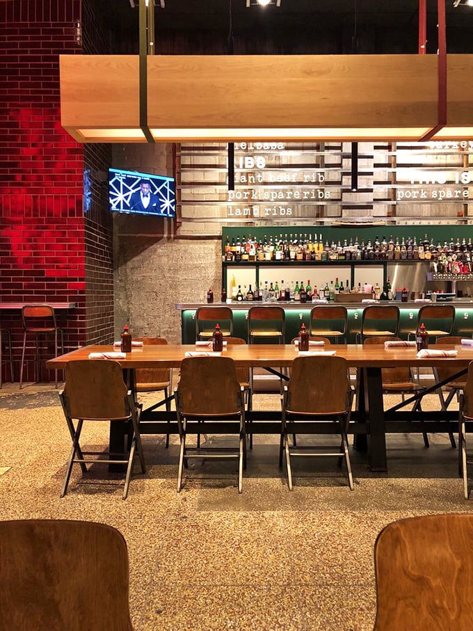 Where industrial chic meets comfort food heaven – those green bar stools have witnessed many a brisket epiphany.