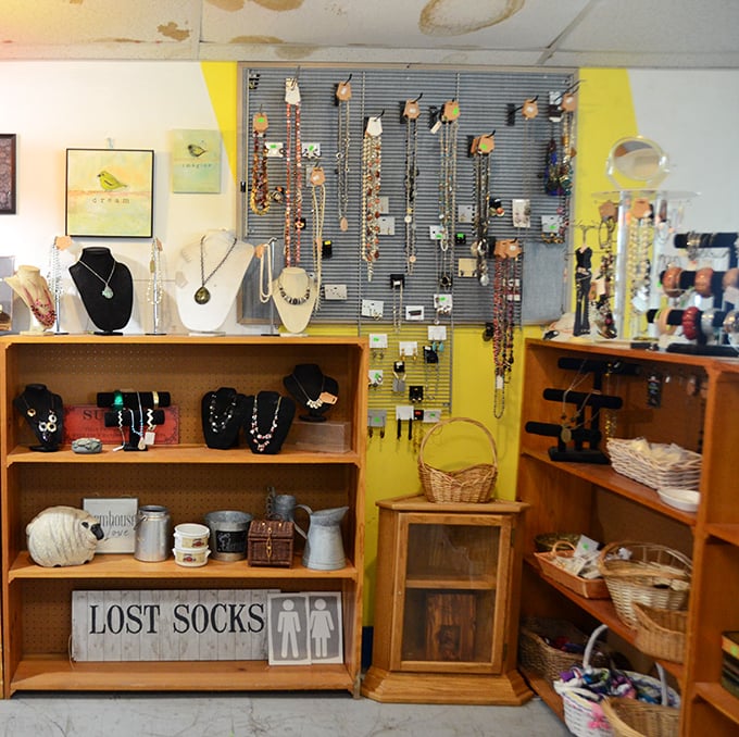 A jewelry lover's paradise where necklaces dangle like stories waiting to be told. That "Lost Socks" sign speaks to my soul on laundry day.