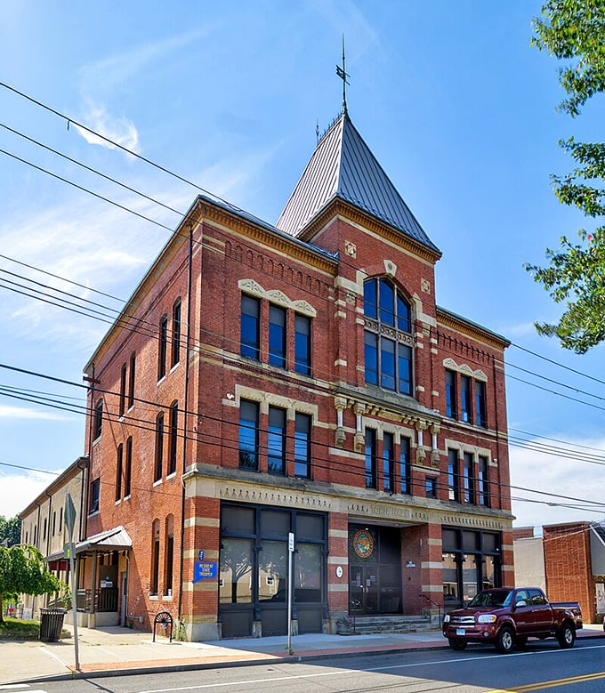 This stately brick town hall isn't just a building—it's a testament to an era when public architecture had personality instead of parking garages.