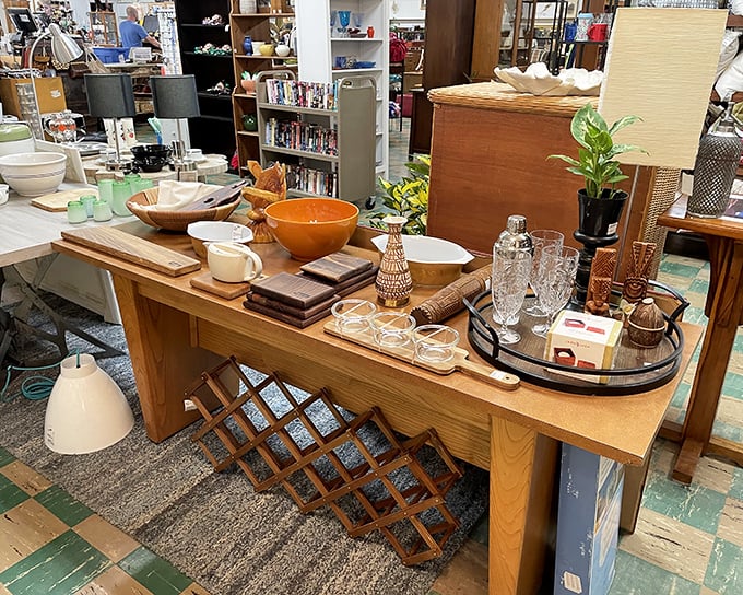 A perfectly staged vignette that whispers, "Your dinner parties could be this fabulous." That wooden wine rack alone has probably seen more sophisticated soirées than most of us.