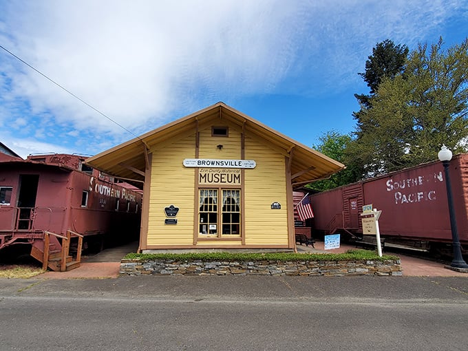 The sunny yellow Brownsville Museum, flanked by vintage train cars, houses treasures that tell the town's story better than any history book ever could.