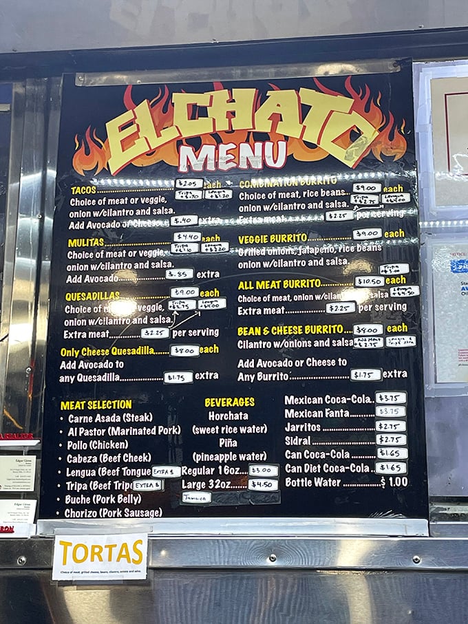 The menu board tells a story of possibility—each item a chapter in your evening's culinary adventure. Choose wisely, or just order one of each.