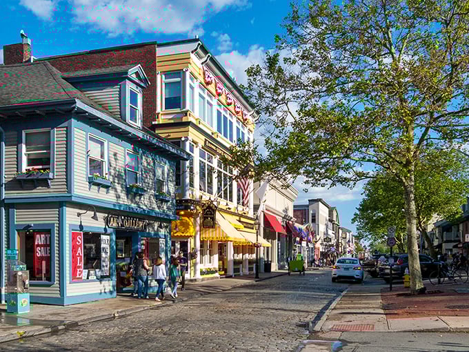 This isn't a movie set—it's Newport's vibrant main street, where local shops offer treasures without the big-city markup.