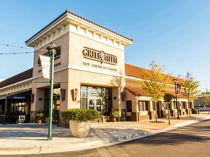 Grillsmith beckons with its warm terracotta tones and promise of new American cuisine—a culinary lighthouse in a sea of shopping bags.