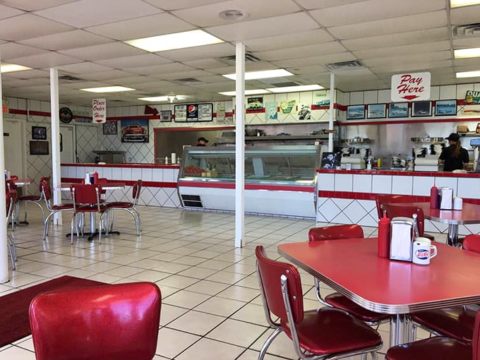 Step inside and time-travel to the golden age of diners—red vinyl chairs, gleaming chrome, and the tantalizing aroma of beef sizzling on the grill.